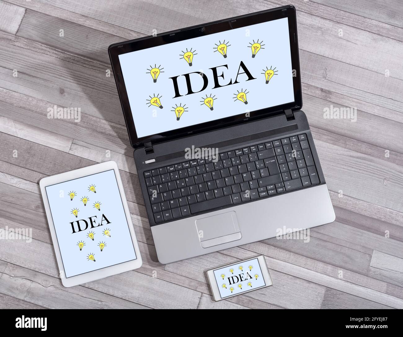 Idea concept shown on different information technology devices Stock ...