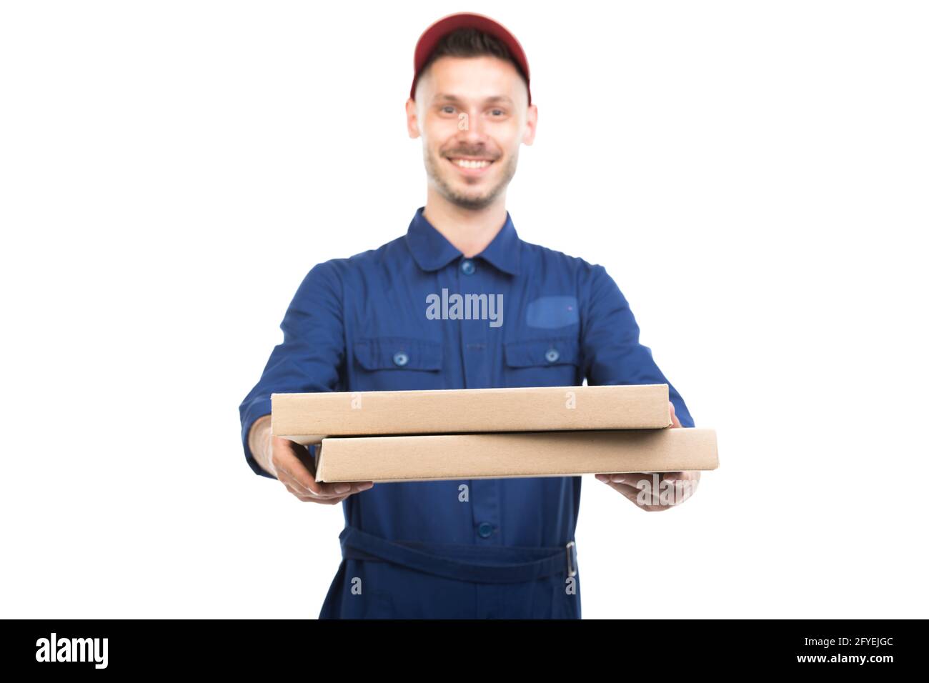 Horizontal medium portrait of handsome young adult Caucasian pizza guy ...