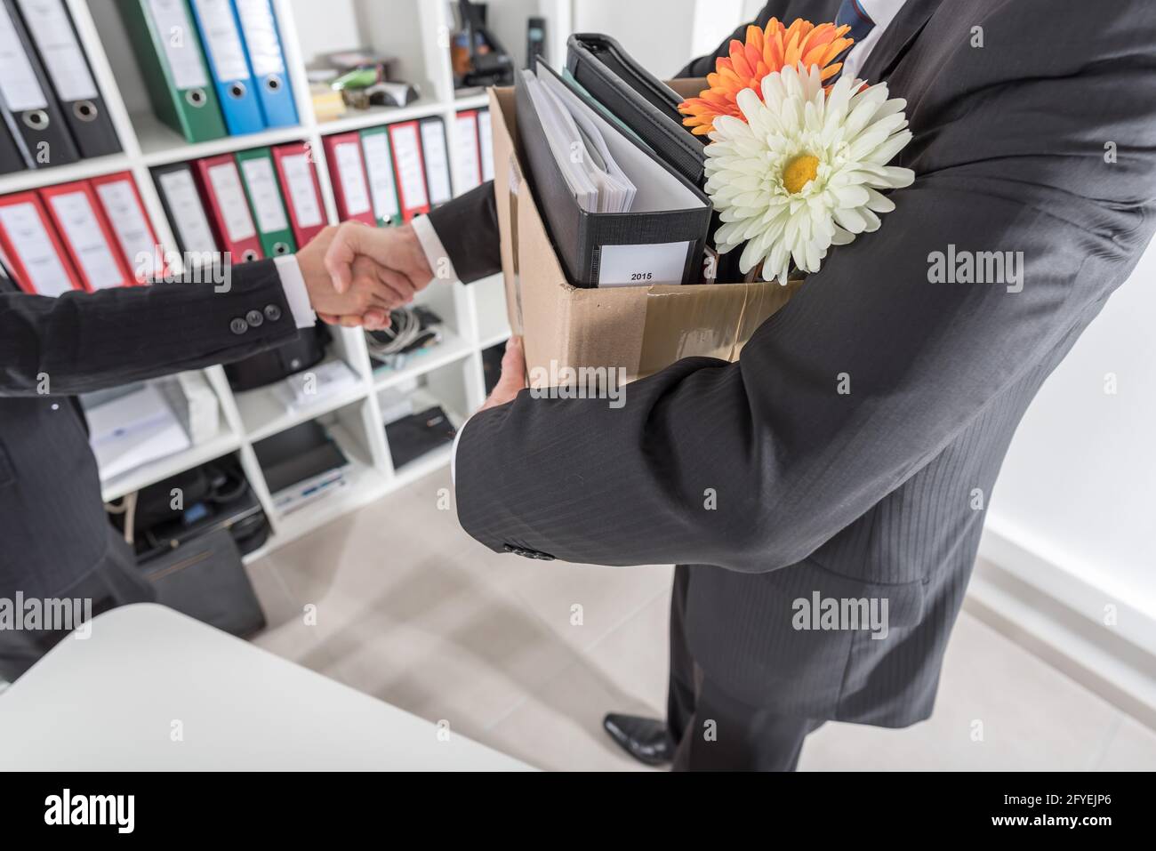 Manager welcoming a new employee at office Stock Photo - Alamy
