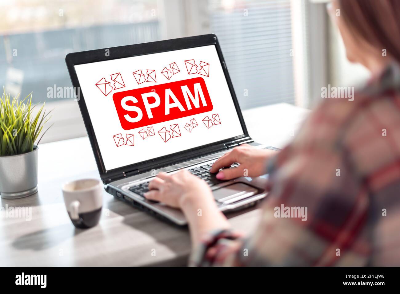 Laptop screen displaying a spam concept Stock Photo - Alamy