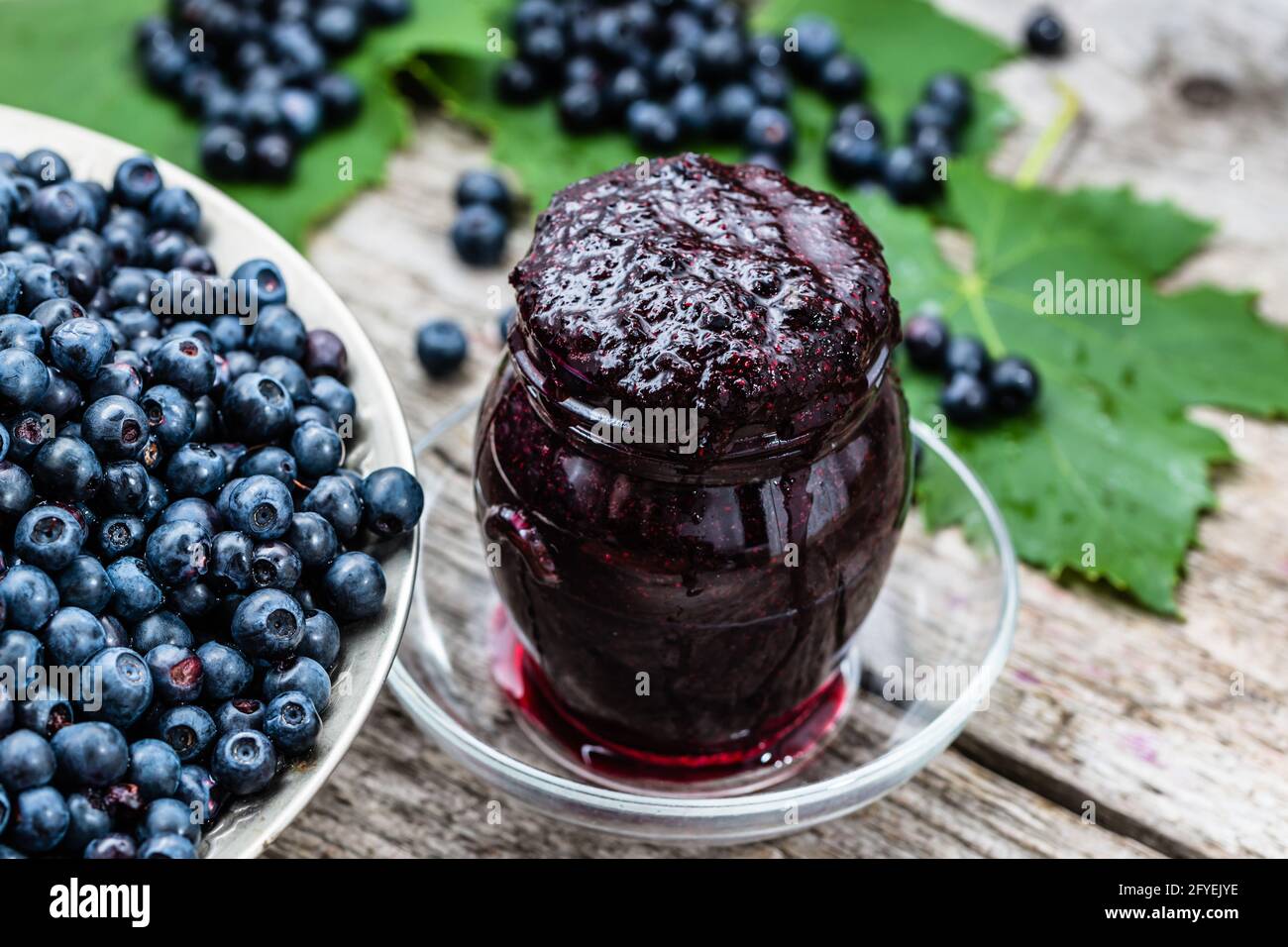 Fresh jam made from blueberries, summer preserves from ripe bilberry ...