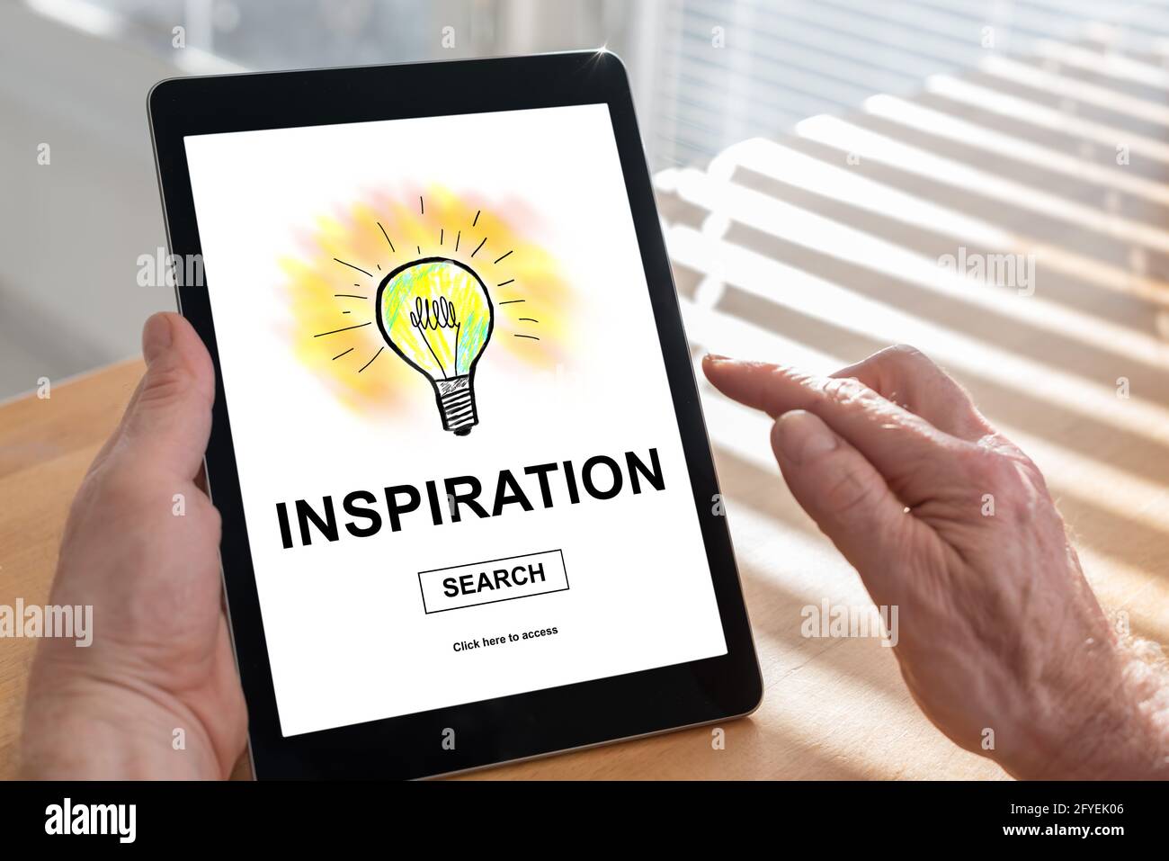 Tablet screen displaying an inspiration concept Stock Photo - Alamy