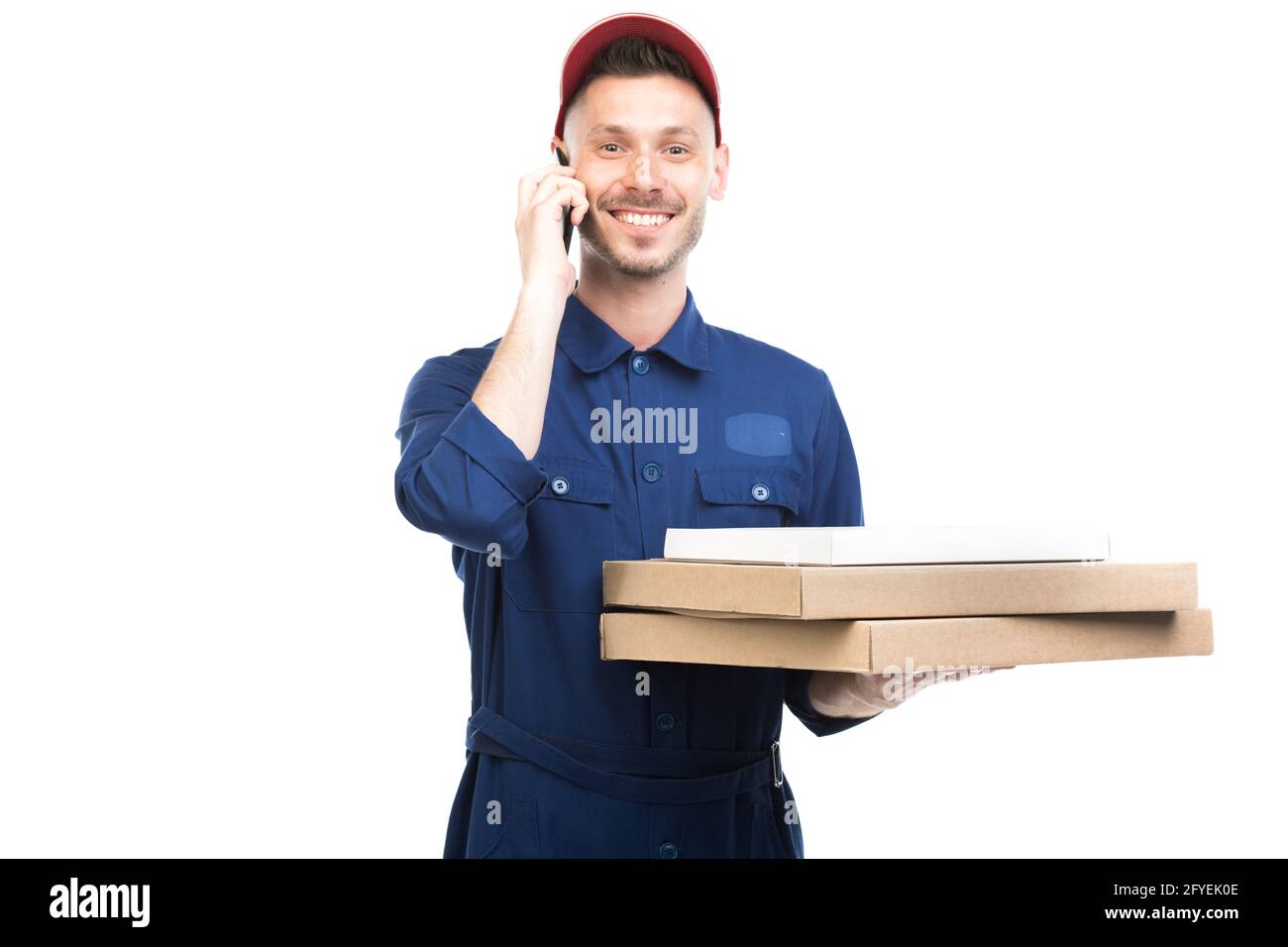 Horizontal medium portrait of handsome young adult Caucasian pizza guy ...