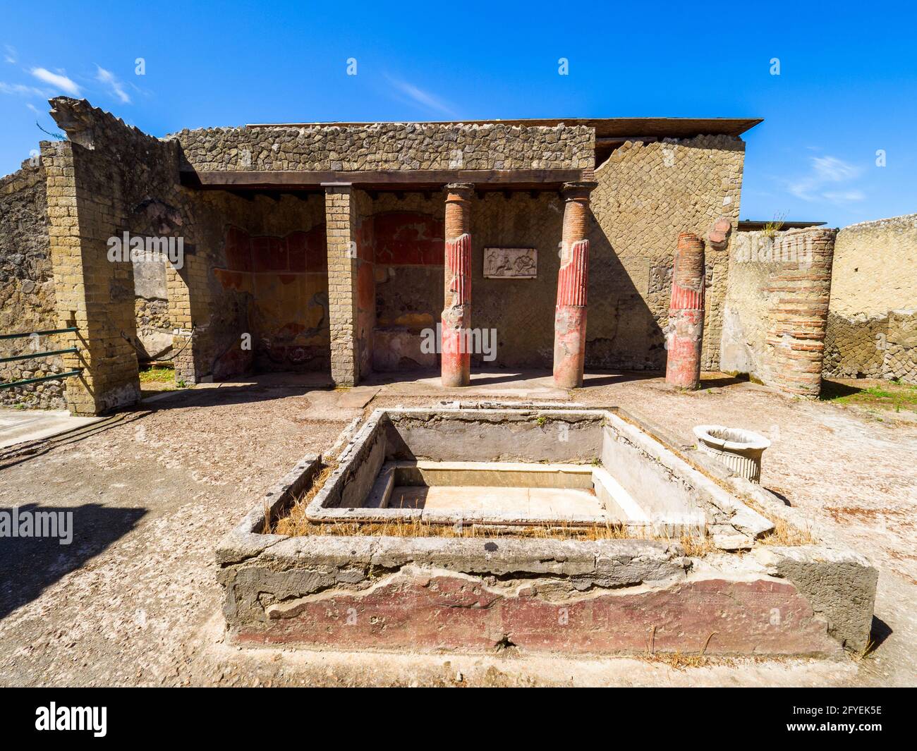 Atrium (central hall) with a central impluvium (water tank) and columns ...