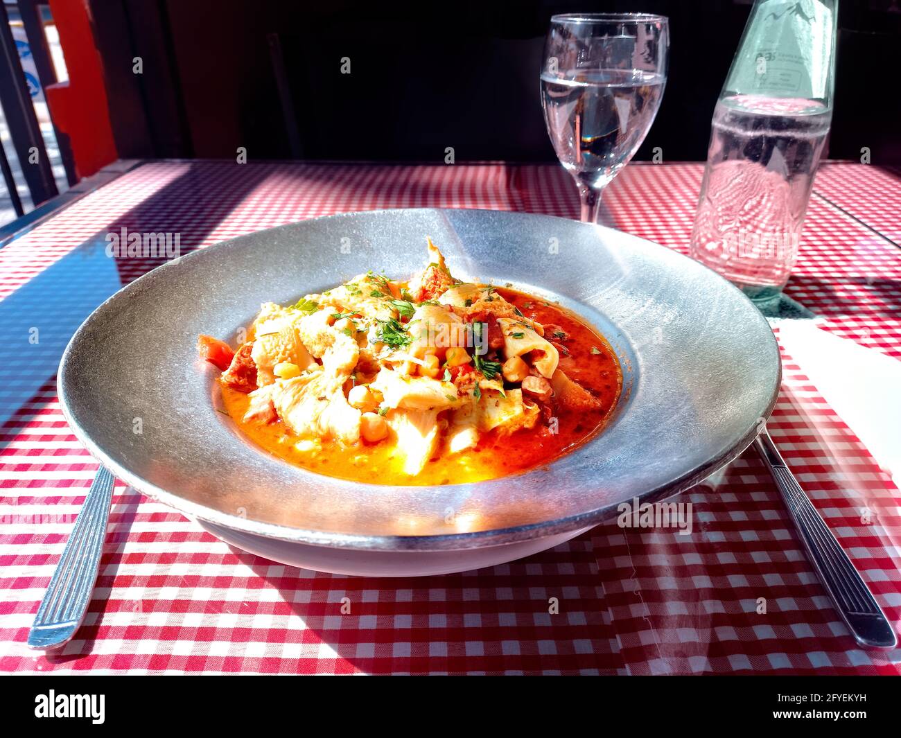 Spanish mondongo. Stew made with tripes, chickpeas, potatoes, tomato ...