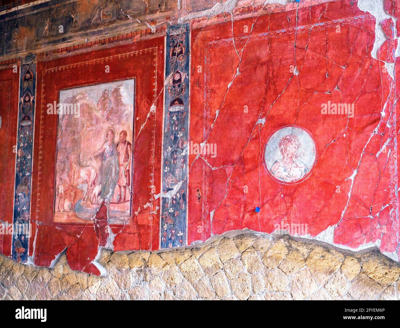 Fresco decorated walls of the tablinum (central room at the end of the ...