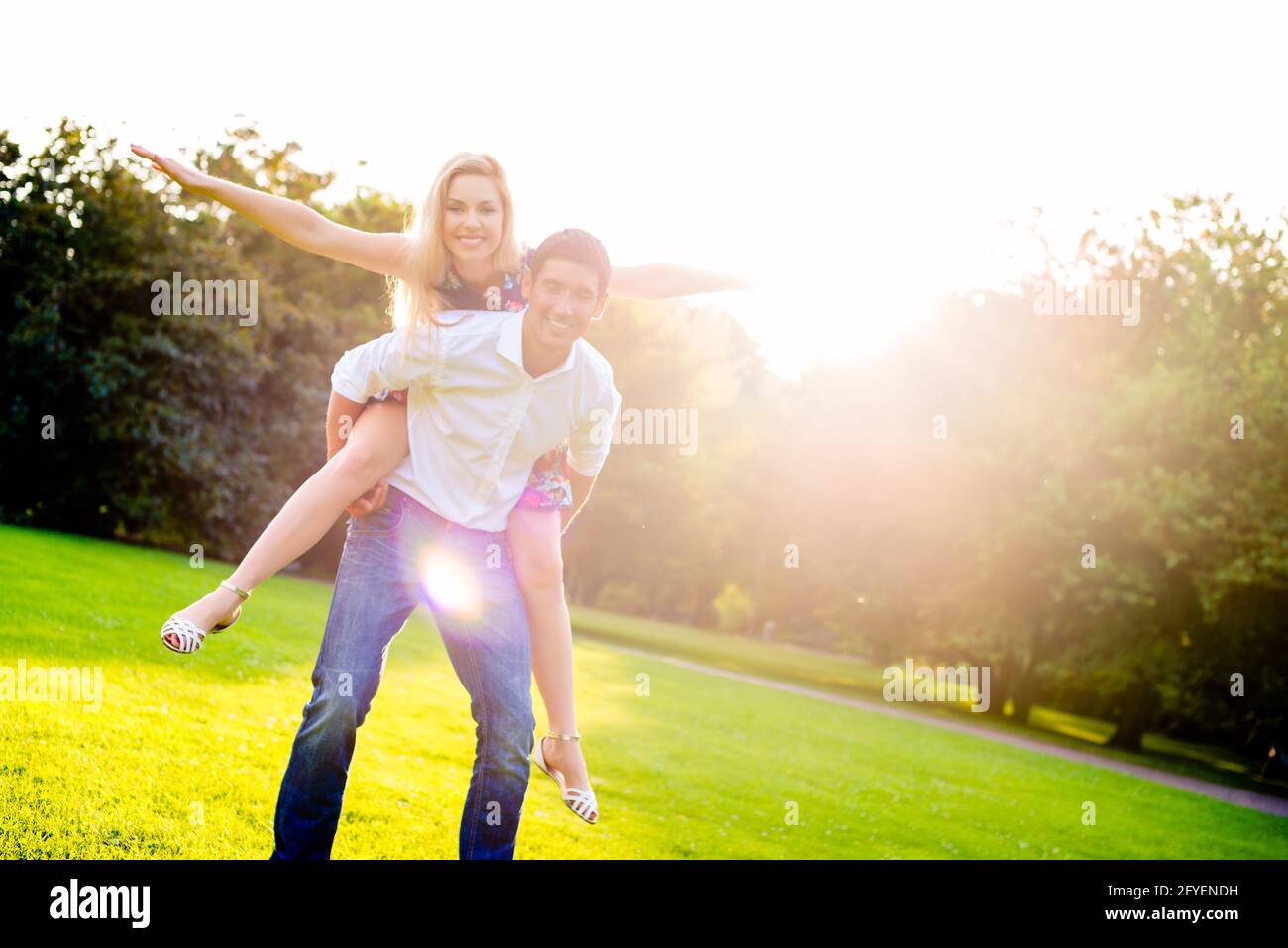 Man carrying girl hi-res stock photography and images - Alamy