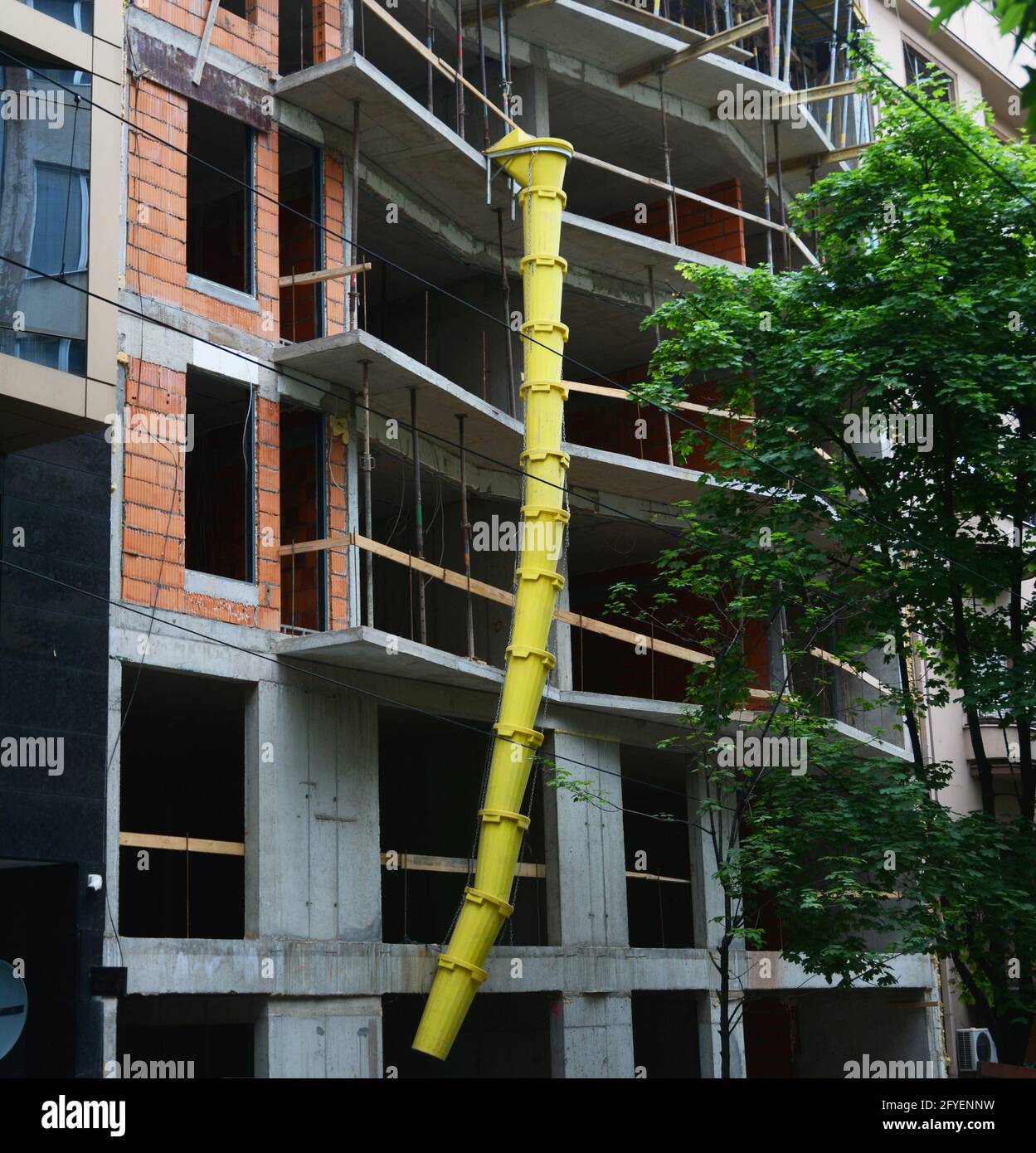 Yellow rubbish chute hi-res stock photography and images - Alamy