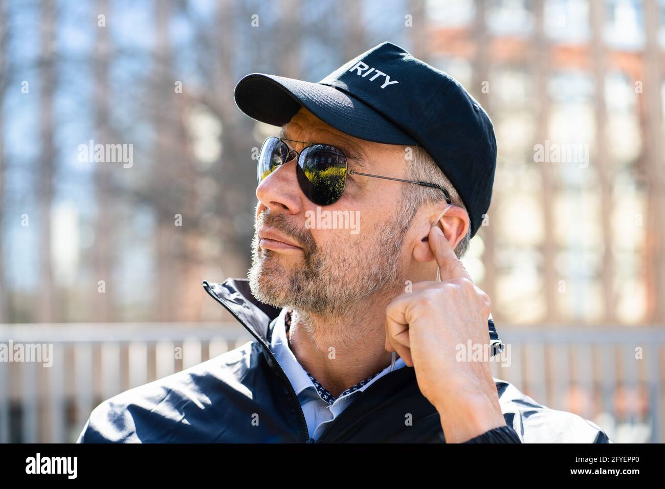 Caucasian security guard standing door hi-res stock photography and ...