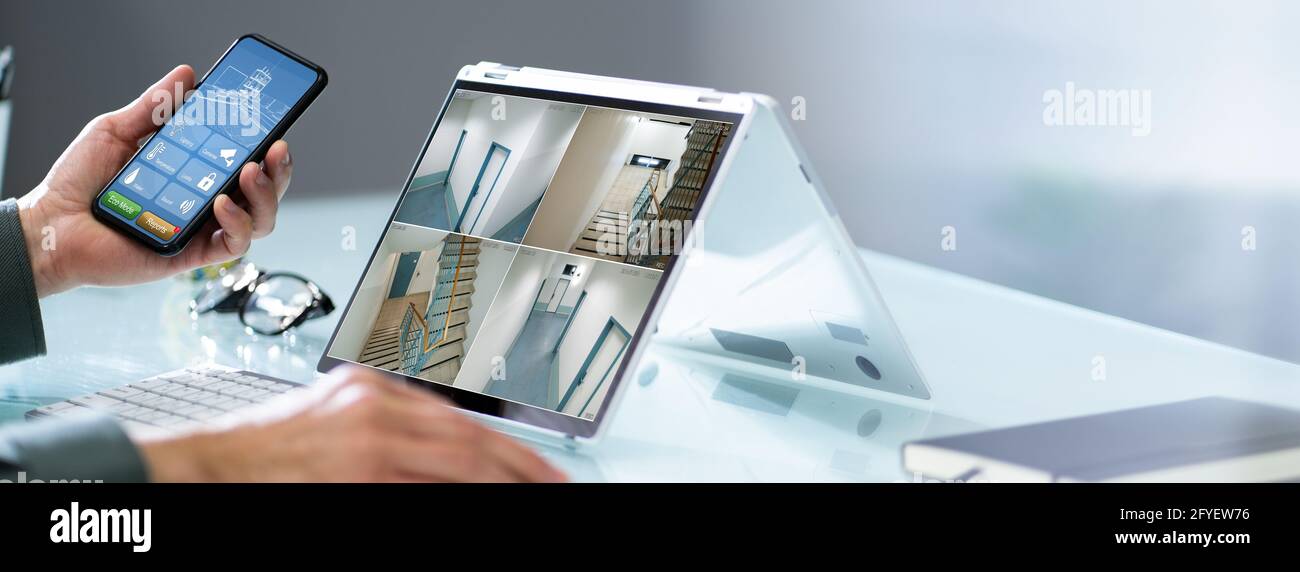 Monitoring CCTV Security Camera Video On Laptop Stock Photo - Alamy