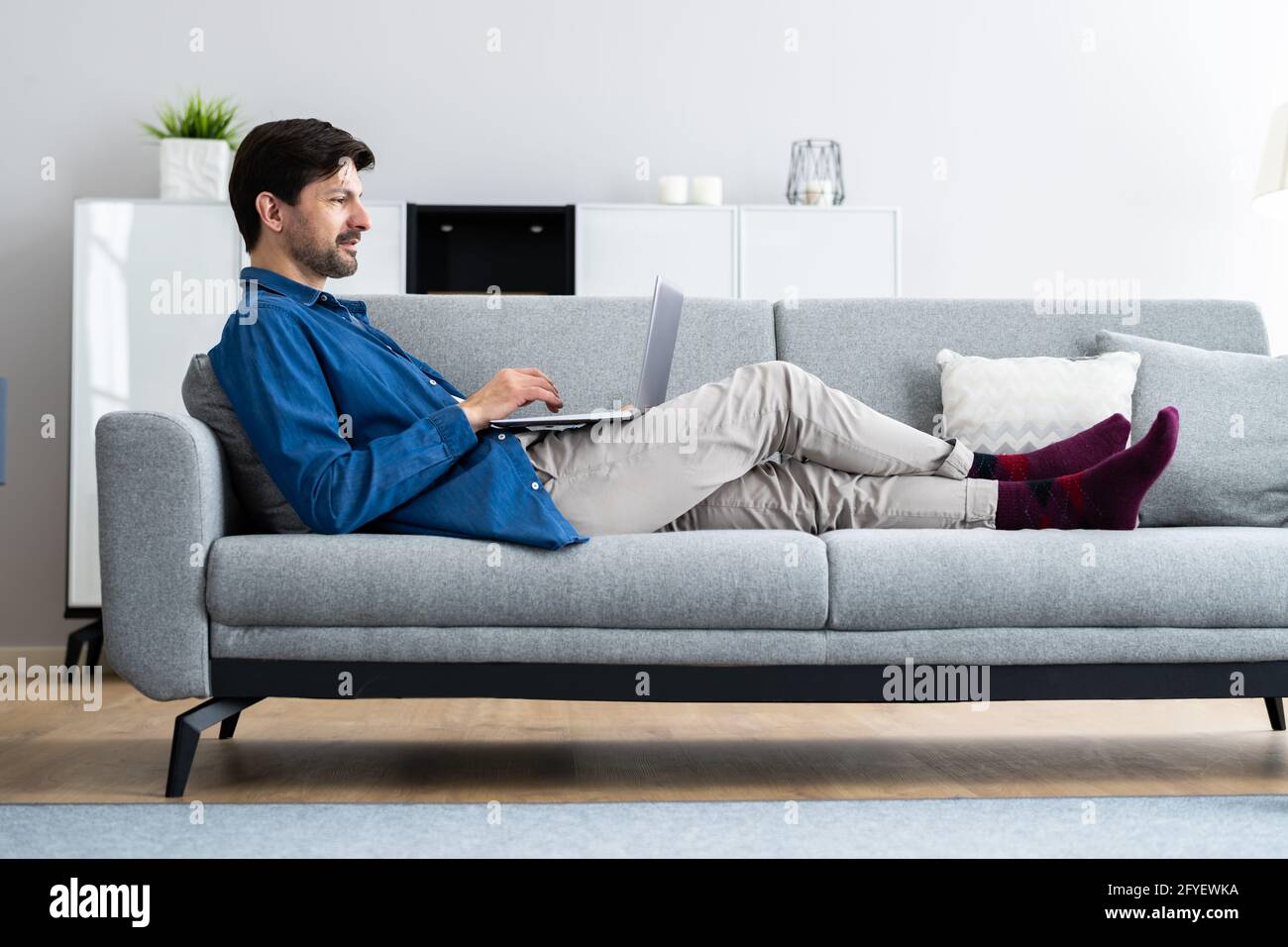 Back of man at computer hi-res stock photography and images - Alamy