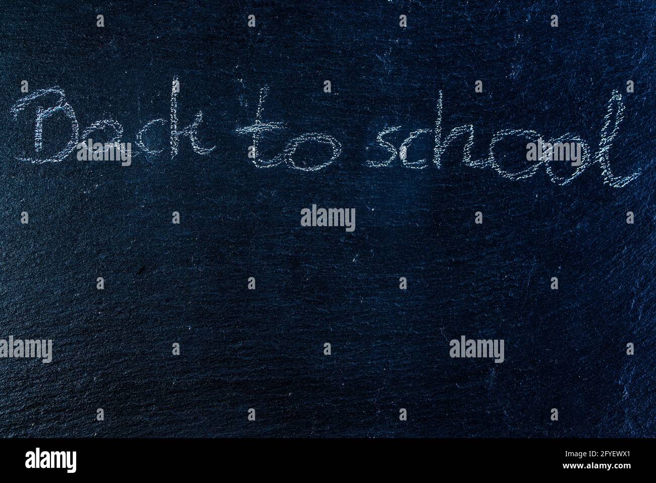 Back to school background, text on blackboard Stock Photo - Alamy