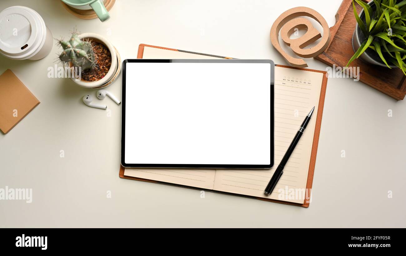 Top view of simple study table with digital tablet include clipping ...