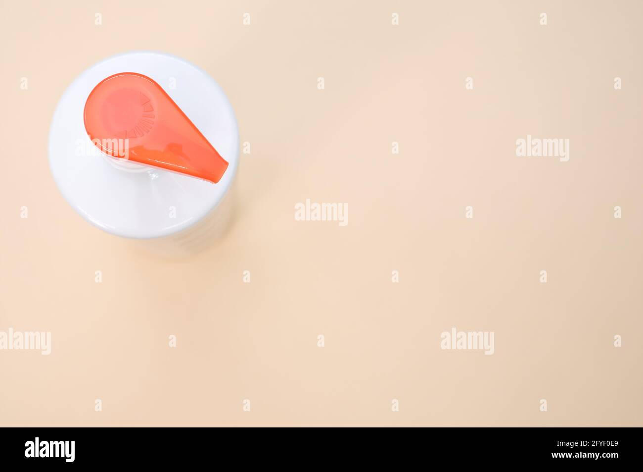 Top view of pump plastic bottle container isolated on pastel background ...