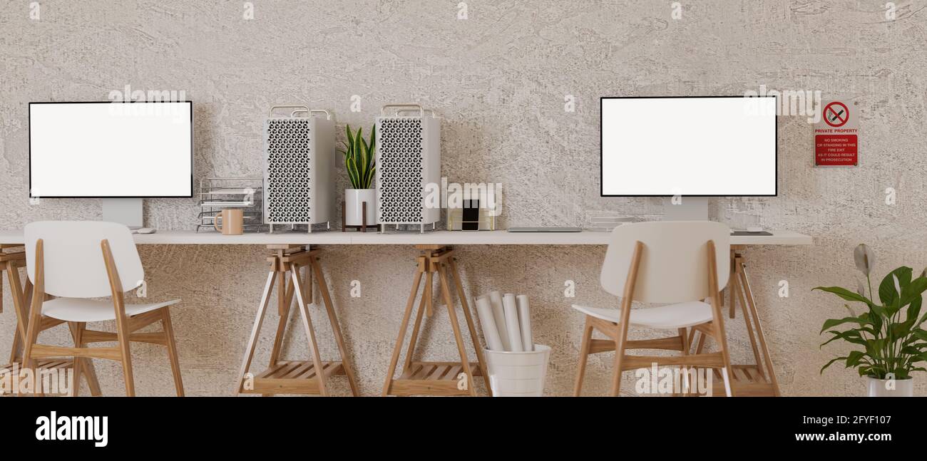 Minimal office desk with two computer devices, supplies, decorations ...