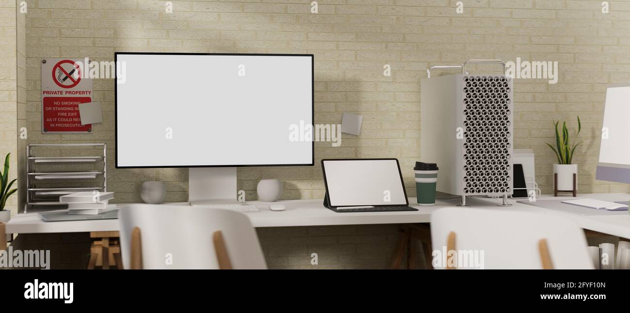 Comfortable workplace with computer, laptop, office supplies ...