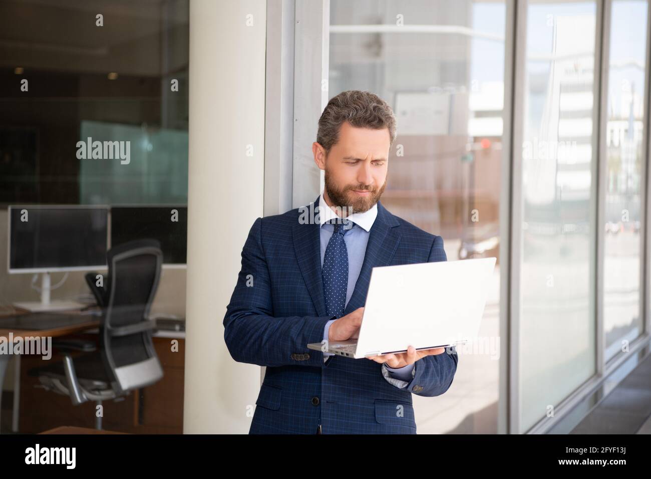 mature businessman working online. business success. programmer man use ...