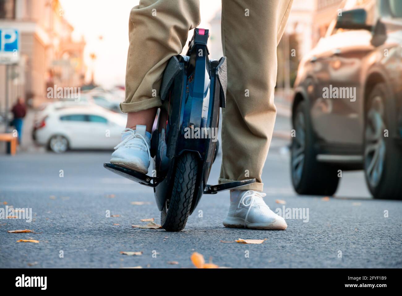 Woman riding a unicycle hi-res stock photography and images - Alamy