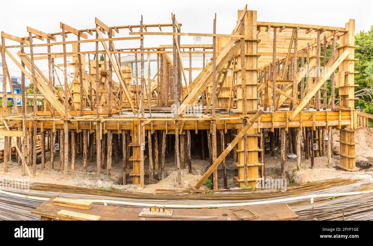 Wooden house being constructed Stock Photo - Alamy