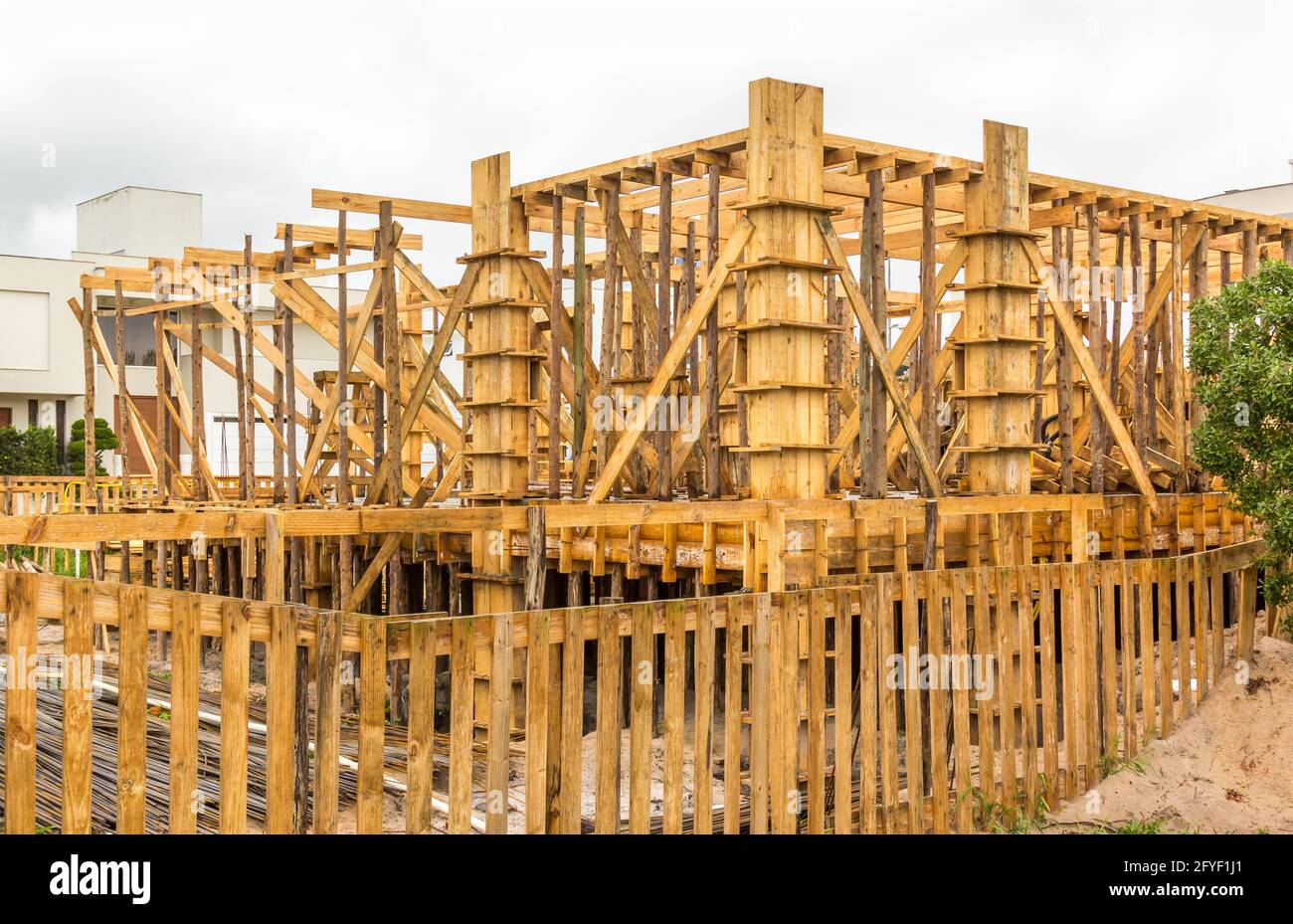 Wooden house being constructed Stock Photo - Alamy