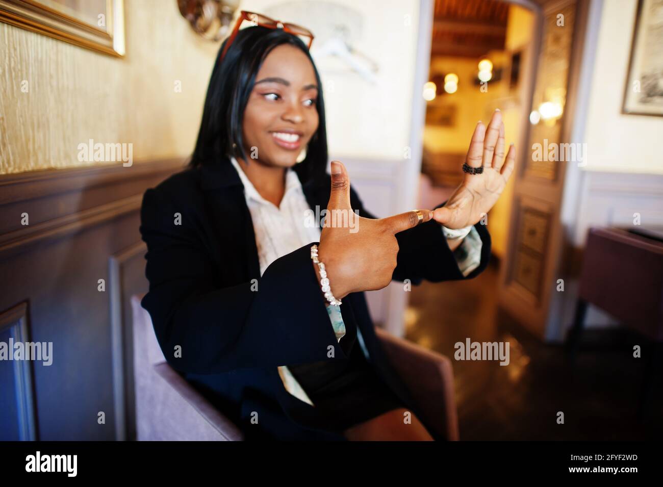 Young deaf mute african american woman using sign language Stock Photo ...
