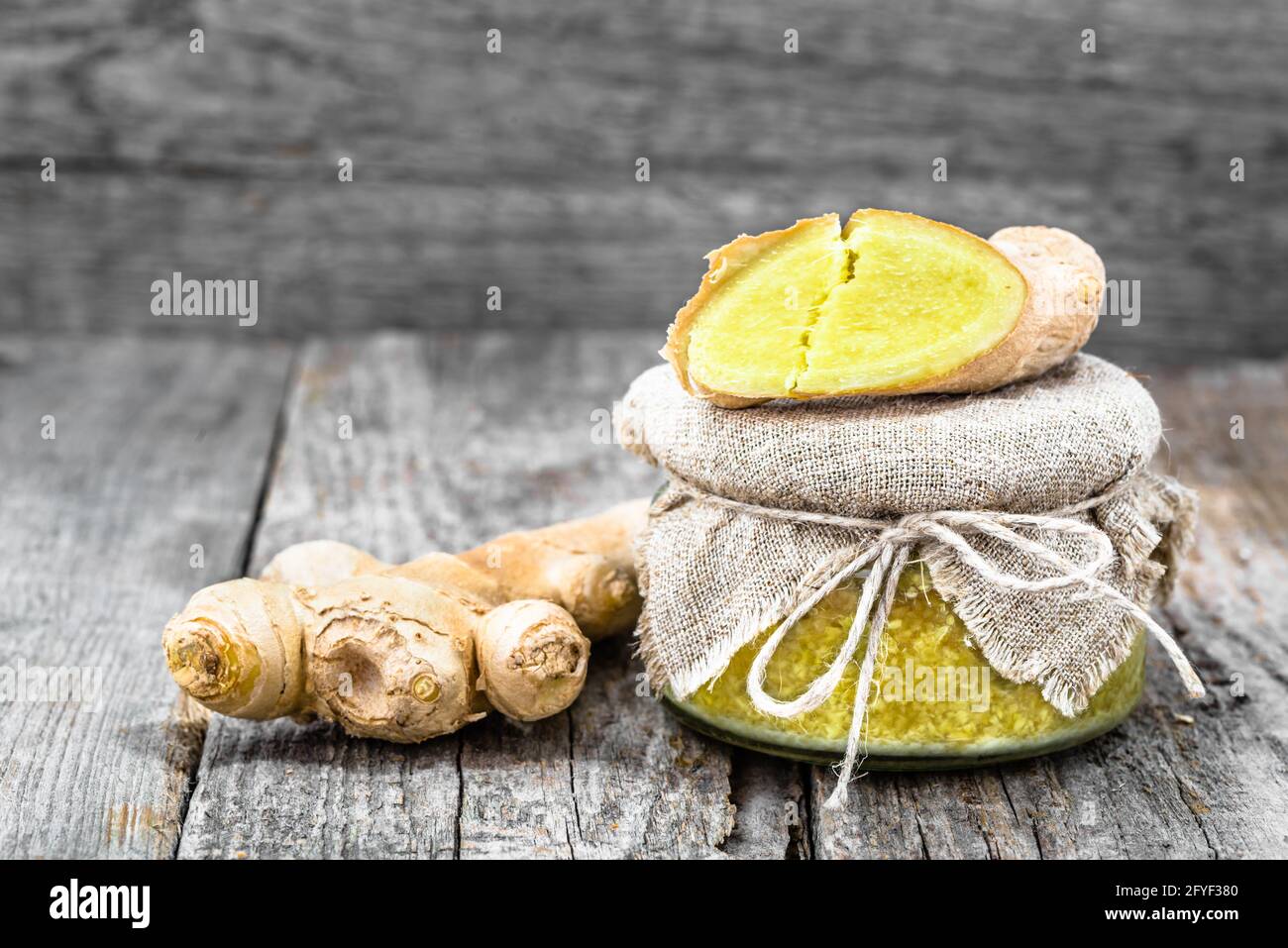 Grated ginger in jar, spice in cuisine, seasoning ingredient for ...