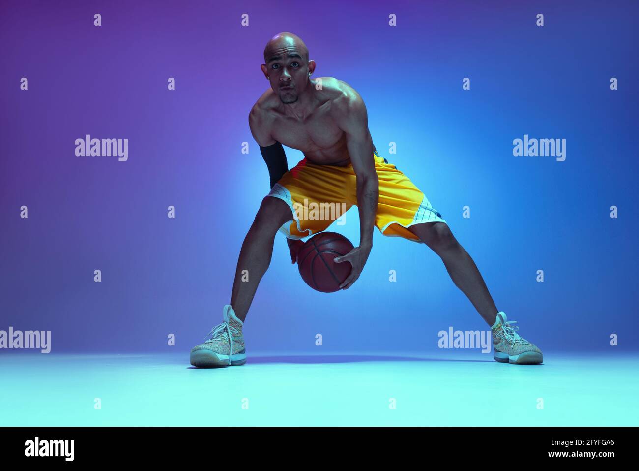 Close-up sportive athletic african-american male basketball player ...
