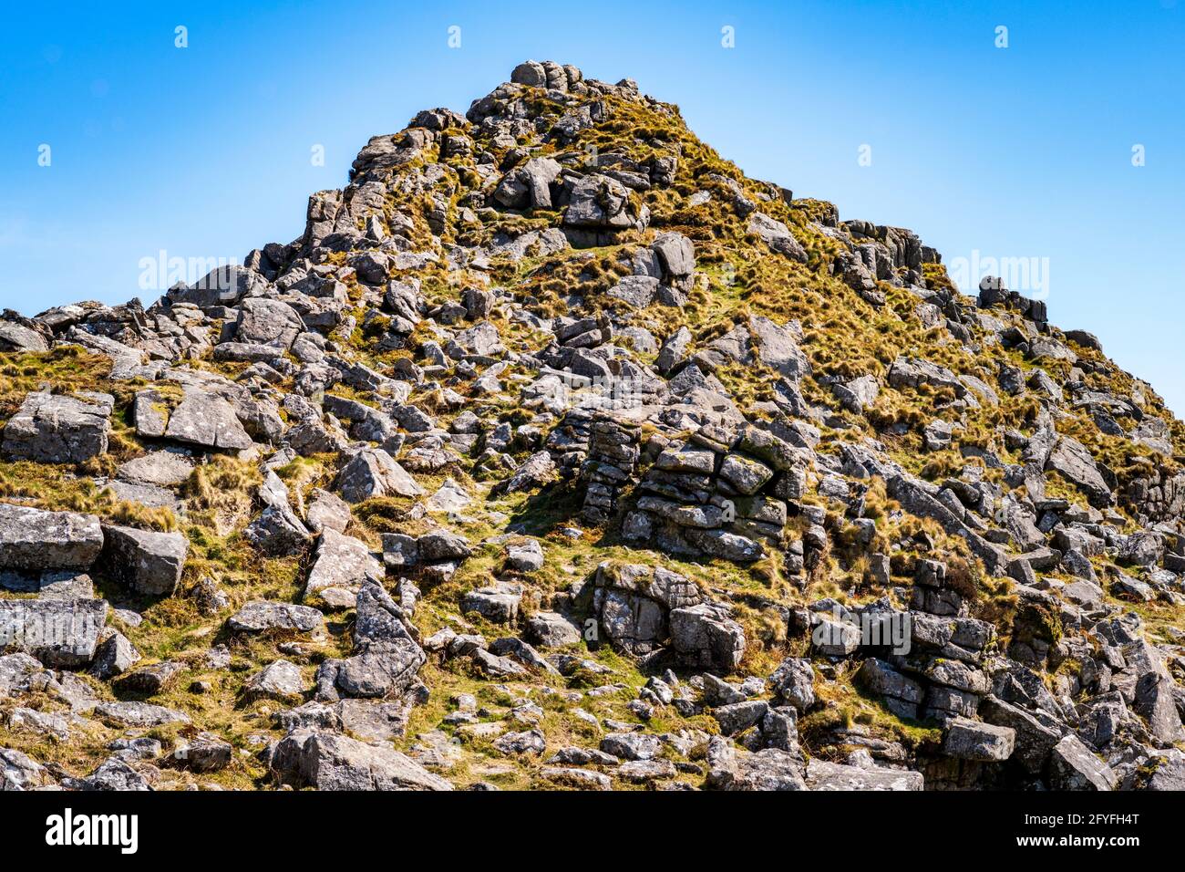 The sharp rocky ridge of Leather Tor resembles a huge dorsal fin rising ...