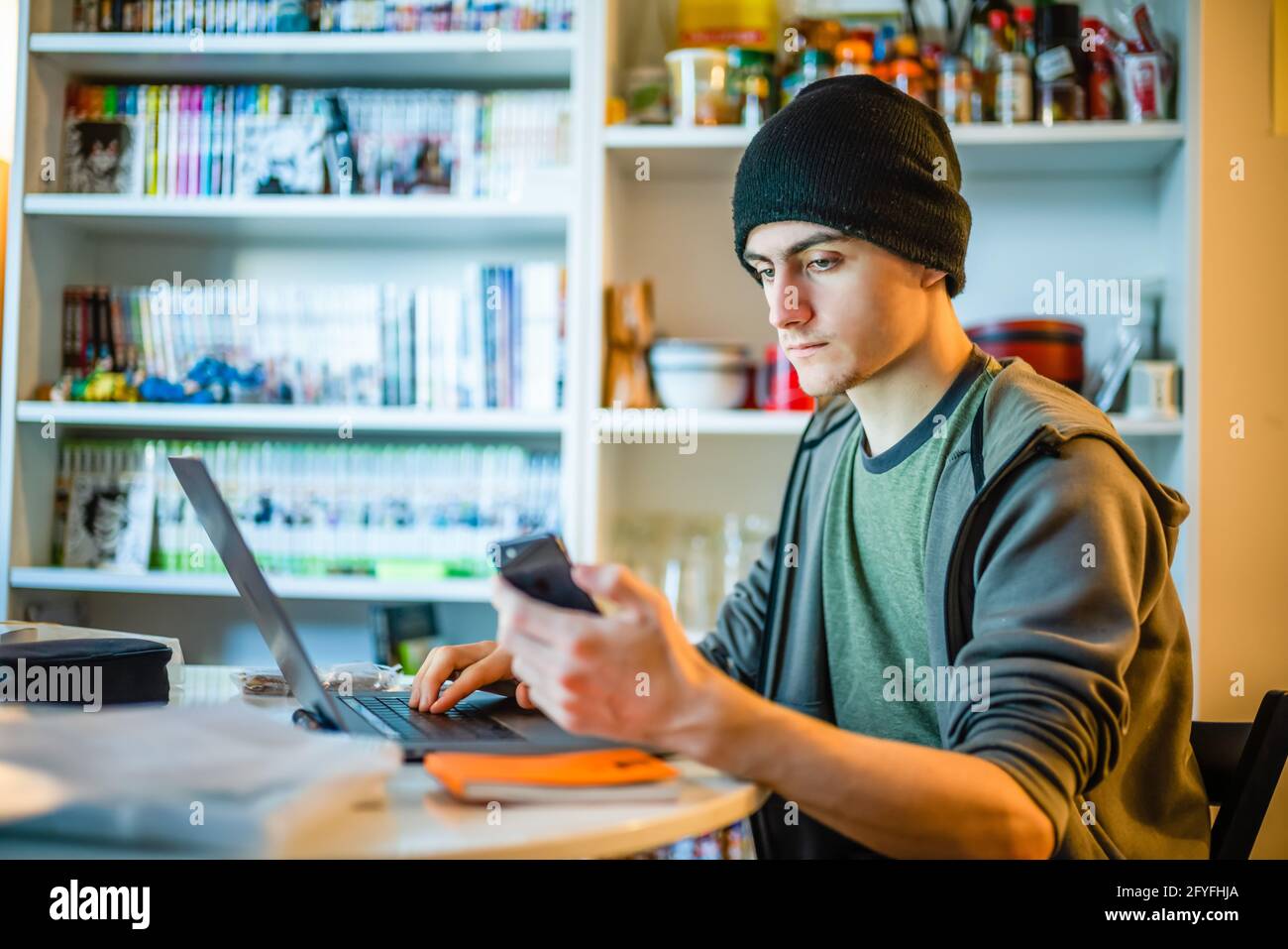 Student playing a video game on a Switch during their remote video ...