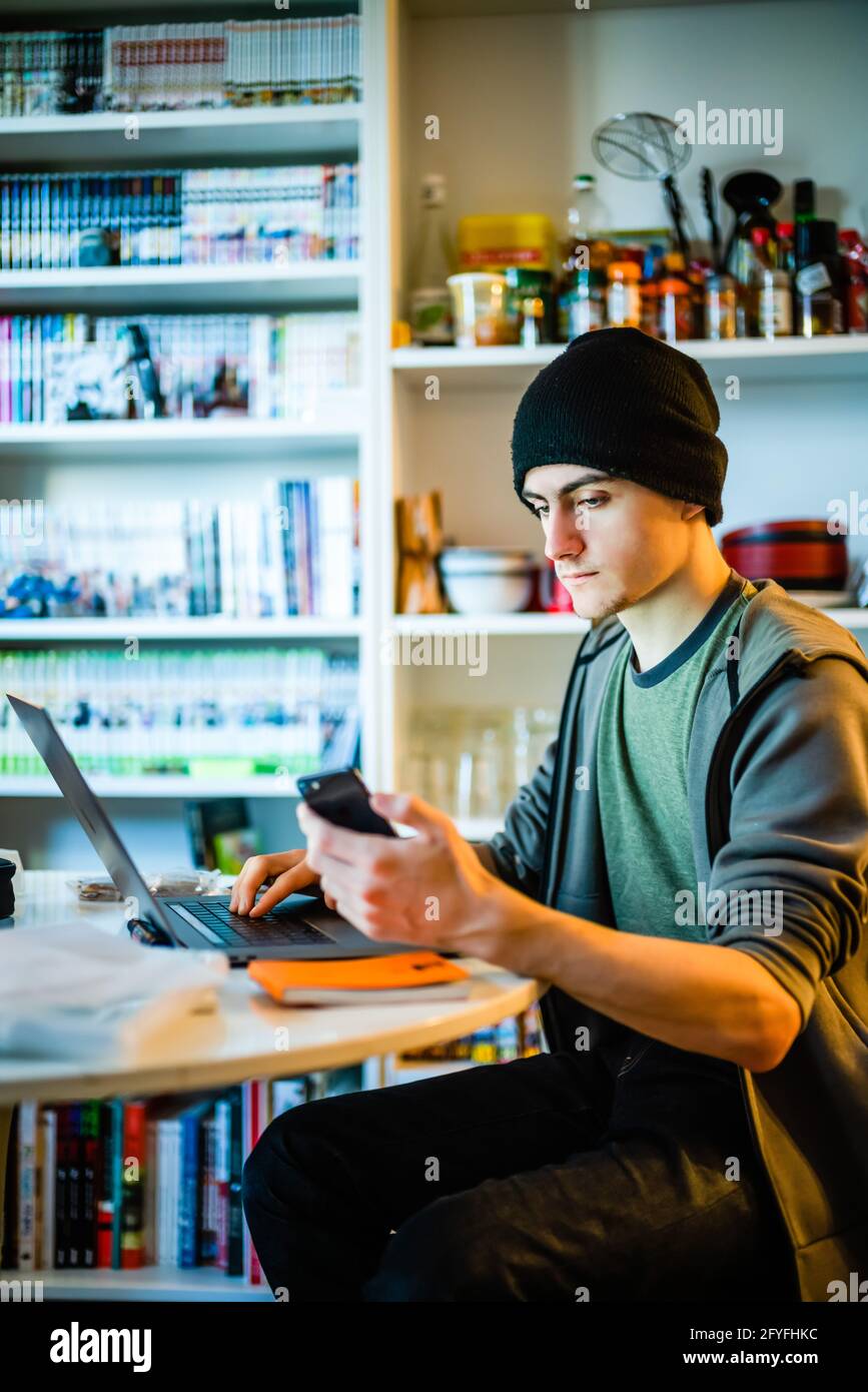 Student playing a video game on a Switch during their remote video ...