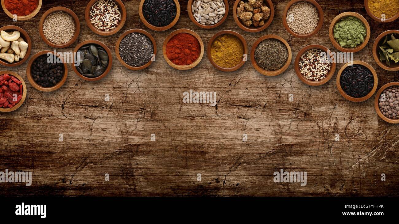 Spices on rustic wood background hi-res stock photography and images ...