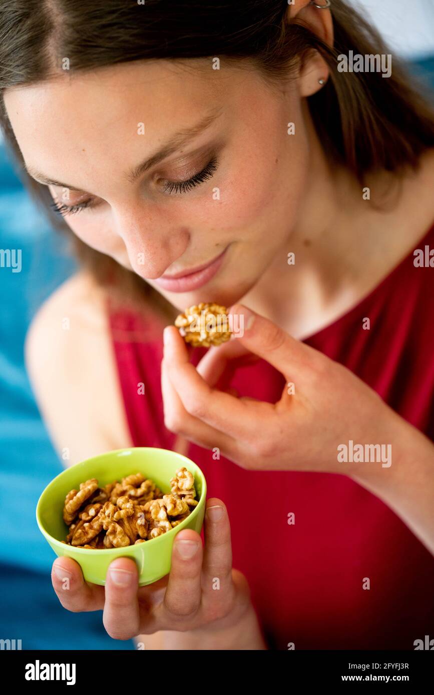 Walnuts woman hi-res stock photography and images - Alamy