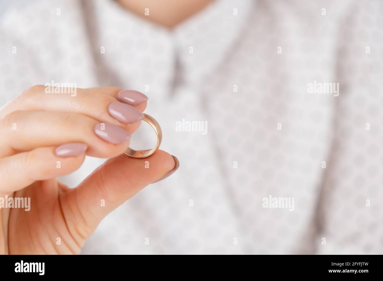 Woman removing ring wedding hi-res stock photography and images - Alamy