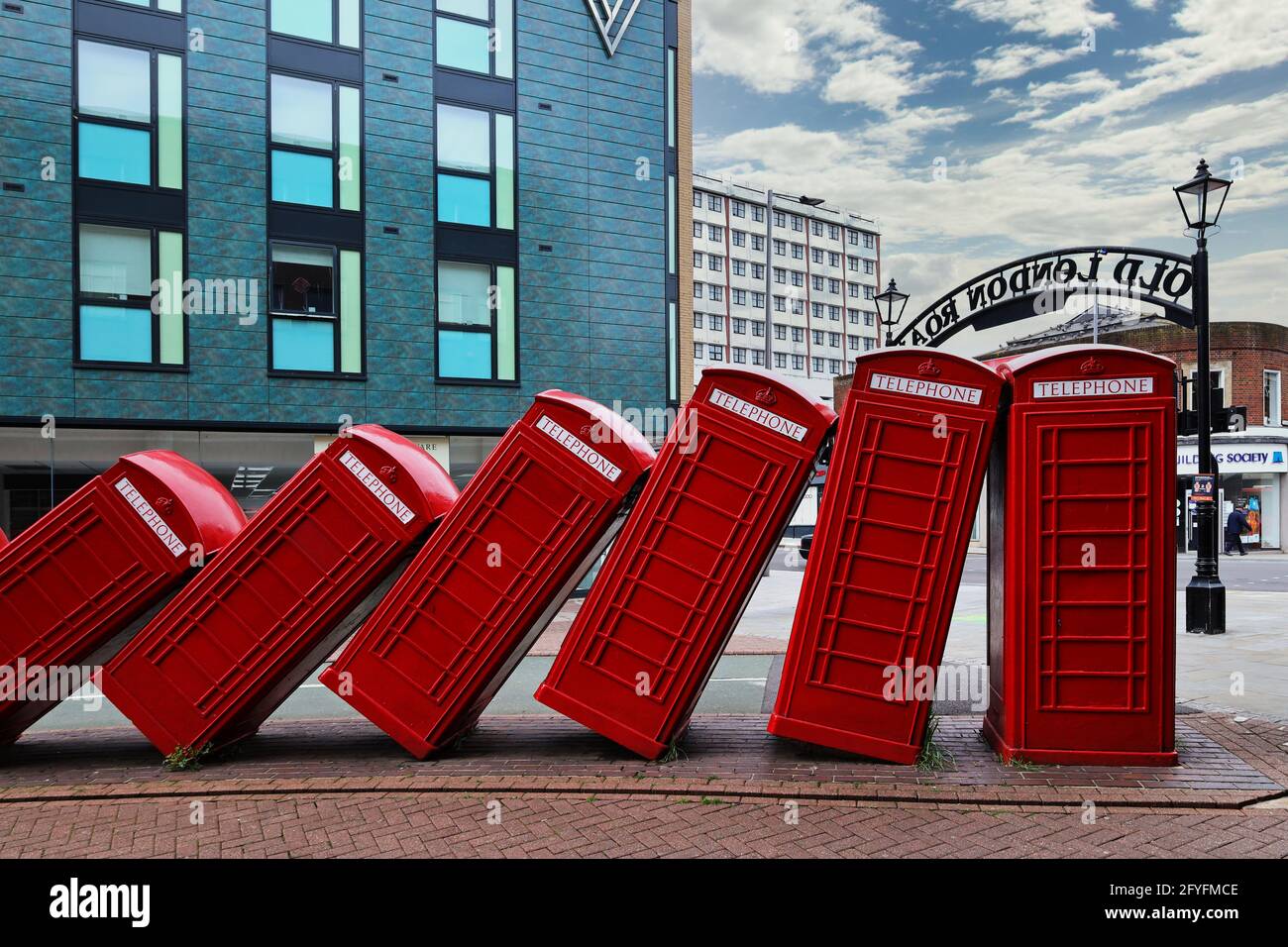 Out of Order by David Mach - a street sculpture of red telephone boxes ...
