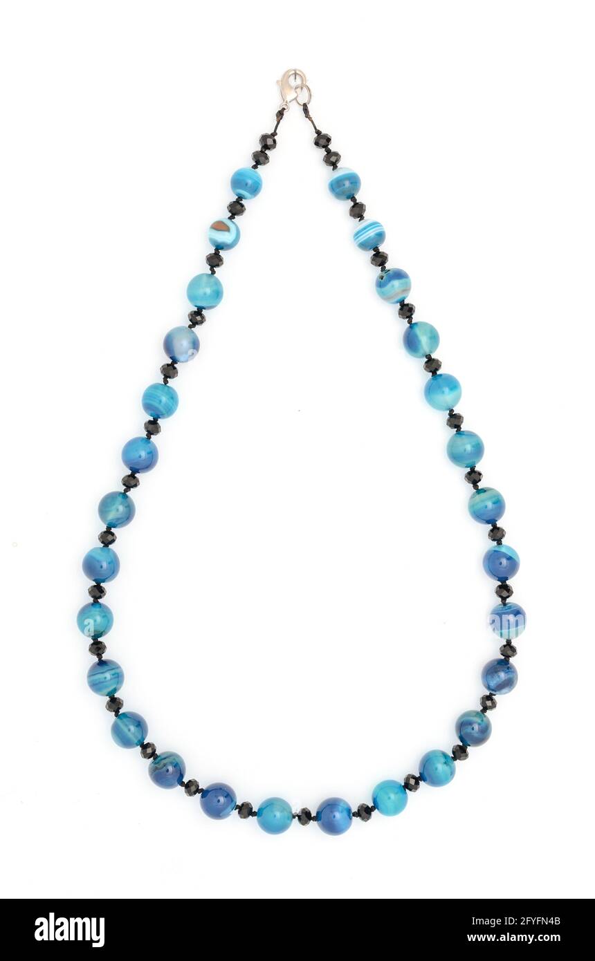 Blue beads isolated Stock Photo - Alamy