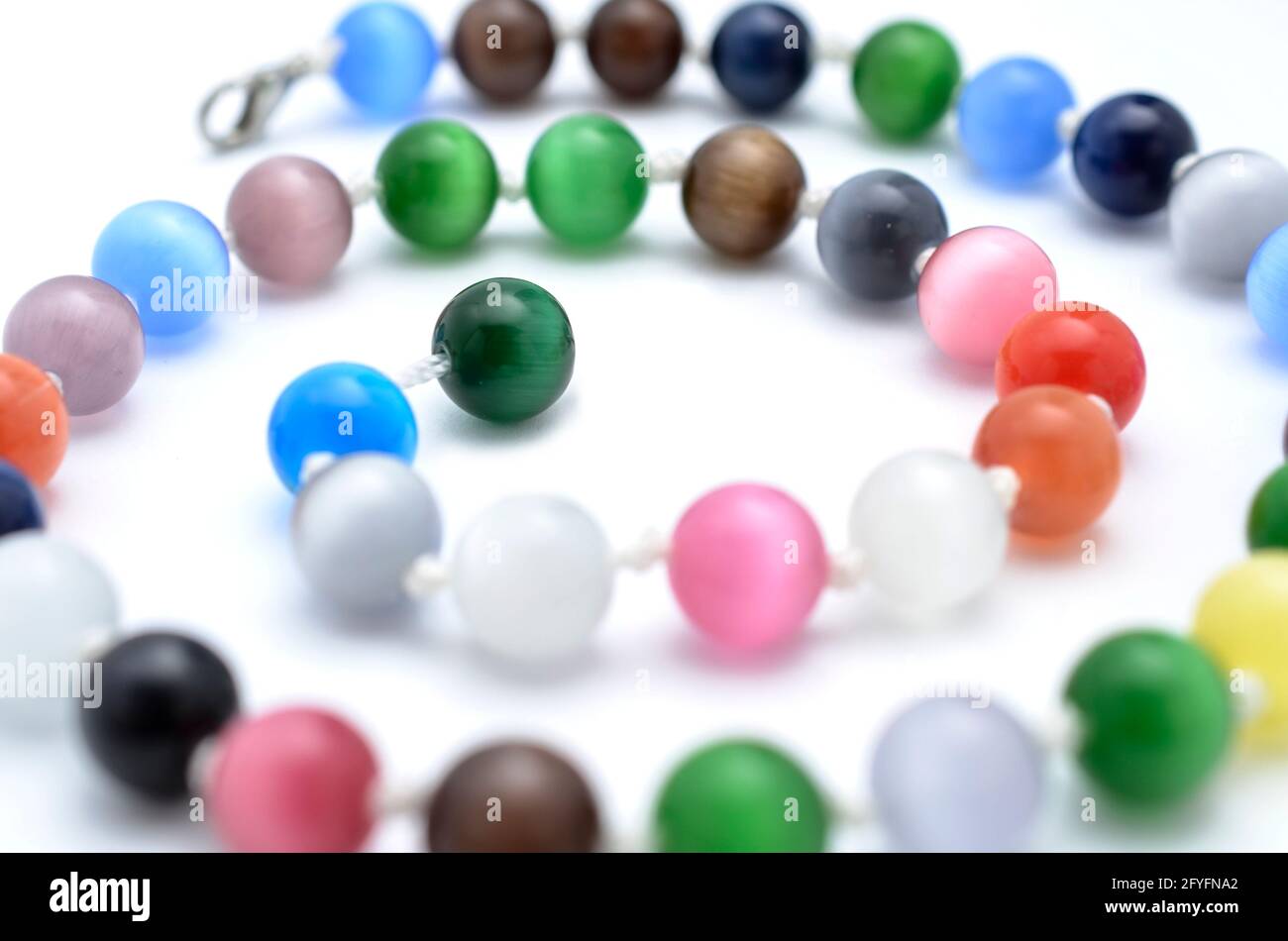 beads from natural stones isolated Stock Photo - Alamy