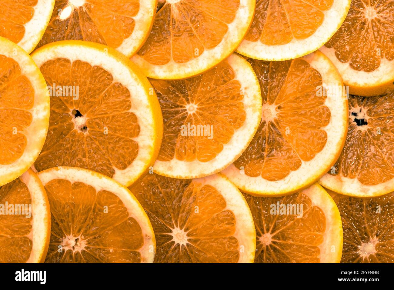 Texture of orange fruit slices, closeup, overhead, citrus background ...