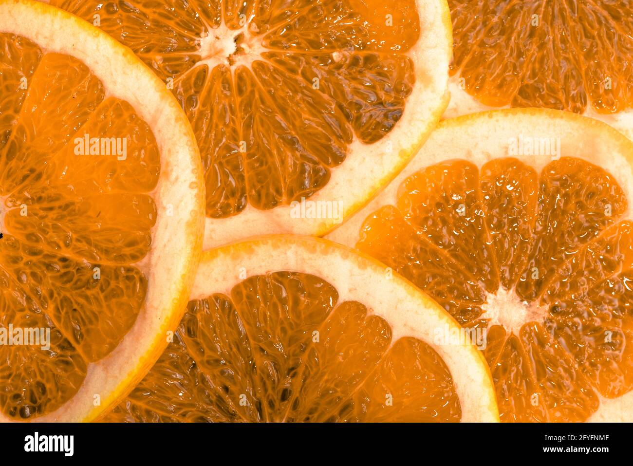 Texture of orange fruit slices, closeup, overhead, citrus background ...