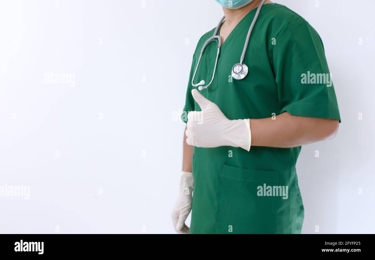 Close-up middle section of doctor and Stethoscope against white ...