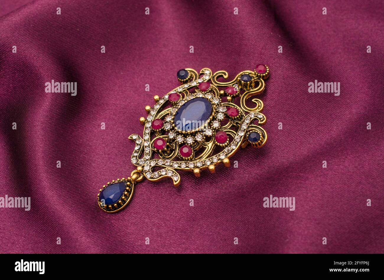 Vintage gold brooch with precious stones isolated on white Stock Photo ...