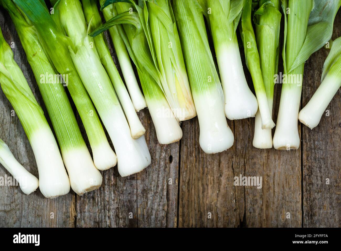Fresh leeks, green vegetables, organic produce, healthy eating concept ...