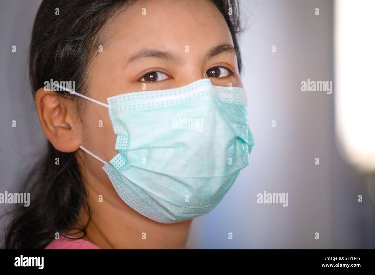 Portrait of women with face mask Stock Photo - Alamy