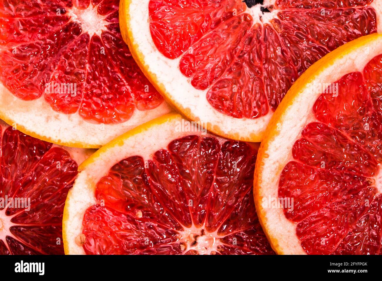 Slices of grapefruits texture, natural backgrounds with citrus Stock ...