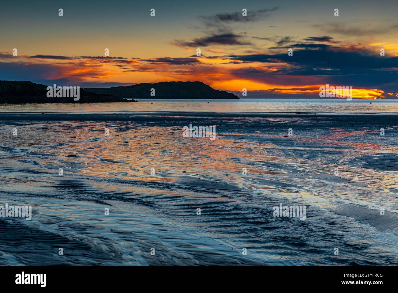 Cemaes Bay at sunset from Great Beach, Traeth Mawr, Anglesey, Wales ...