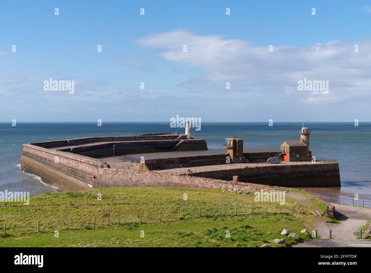 Whitehaven Cumbria The West Pier Lighthouse and harbour wall uk Stock ...