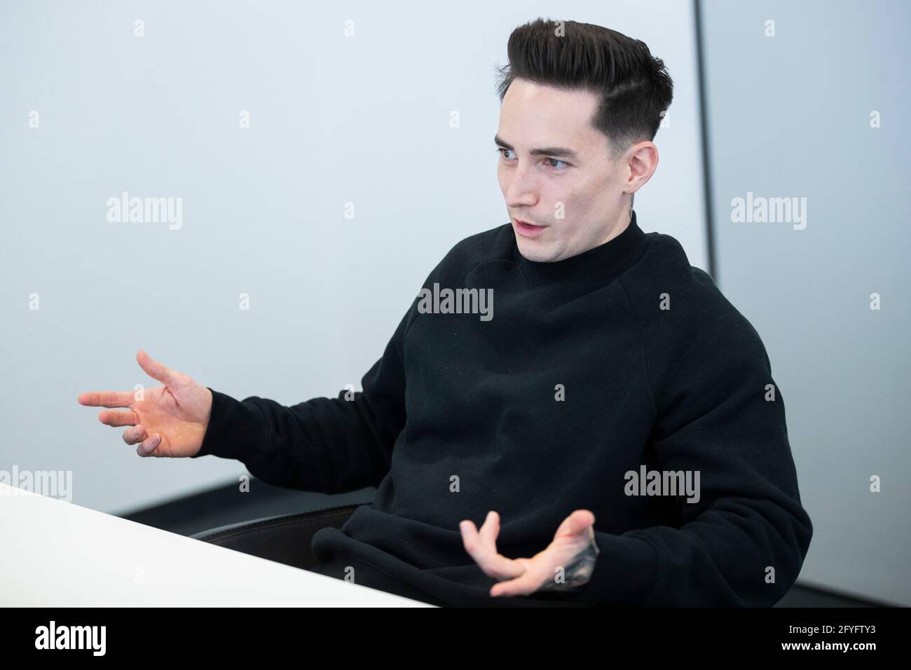 Fellbach, Germany. 25th May, 2021. German gymnast Marcel Nguyen speaks ...