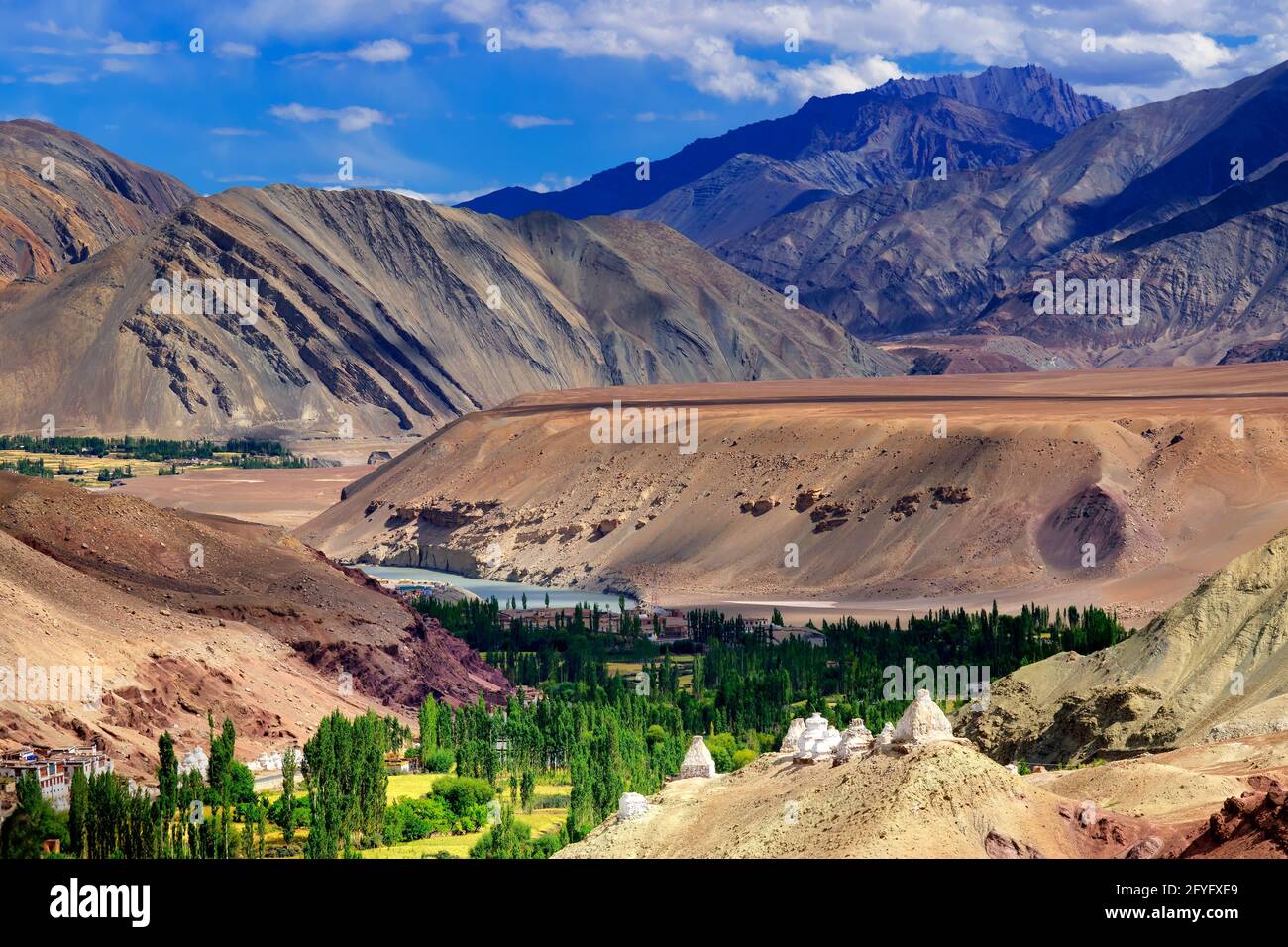 Top view of ladakh landscape, green valley field with barren mountains ...