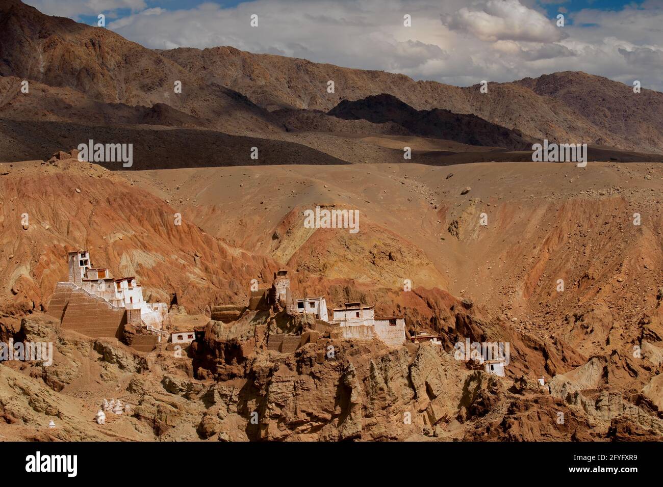 Ruins and Basgo Monastery surrounded with stones and rocks of Himalayan ...