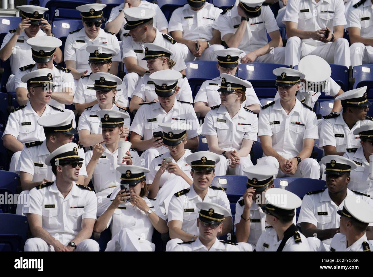 Annapolis, United States. 28th May, 2021. Naval Academy Midshipmen wait ...