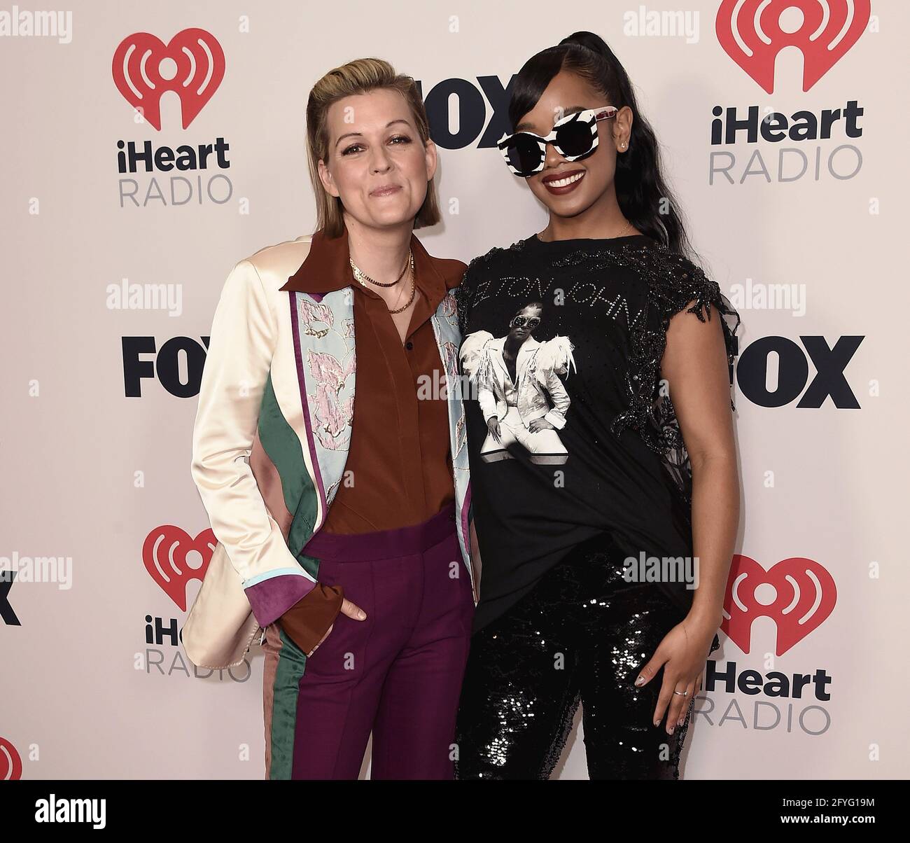 2021 IHEART RADIO MUSIC AWARDS: Brandi Carlile and H.E.R. attend the ...